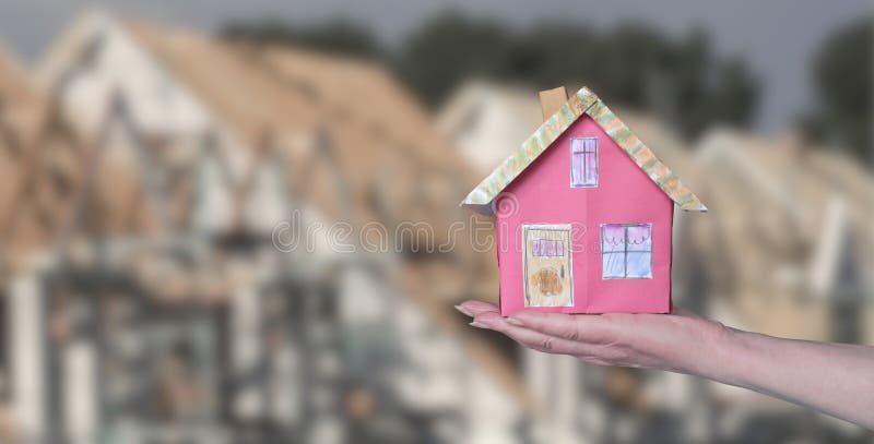 Construction and Architecture Concept. Cute Model Home on a Female Hand ...