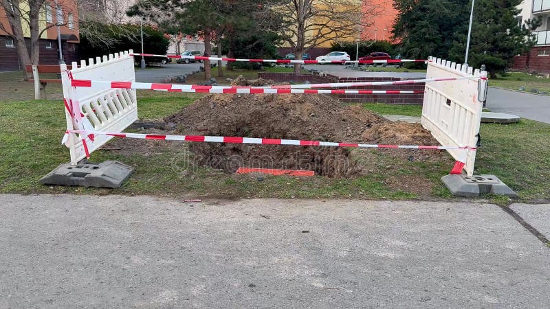 Construction Area Marked with Warning Barriers in the Park To Ensure ...