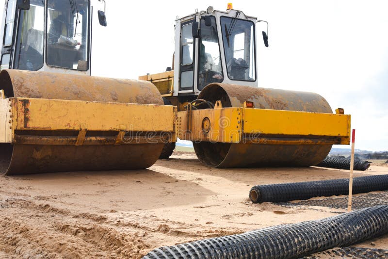 Construction Asphalt Paving Equipment Driving on the Road Stock Photo ...