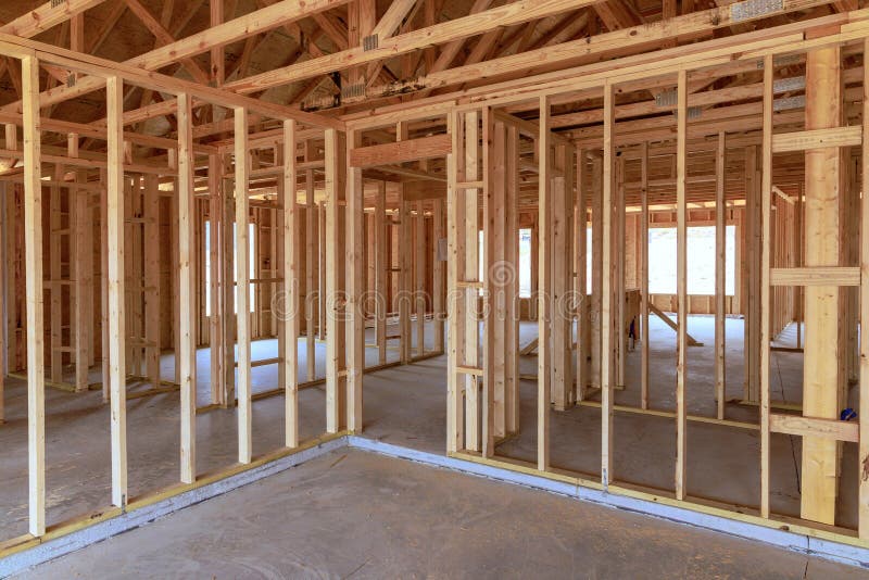 Construction during are Assembling Wooden Beams To Form Framework of ...