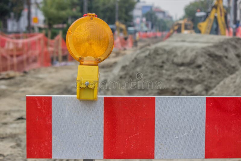 Construction Barrier Sign with Yellow Warning Ligh Stock Photo - Image ...