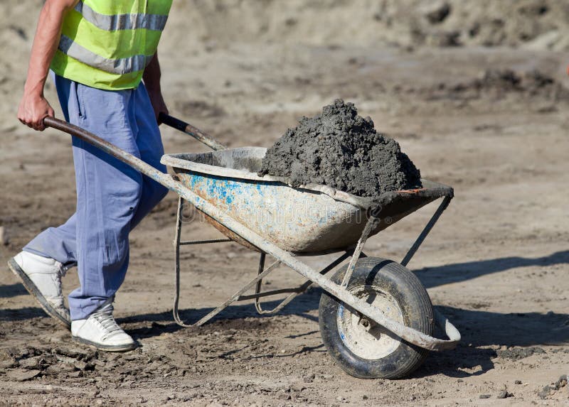 Construction Barrow with Concrete Stock Photo - Image of clothes ...