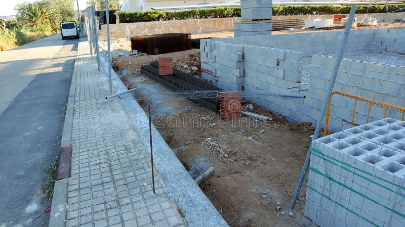 Construction Begins for Pool Pit with Curbstone Installation and Mesh ...