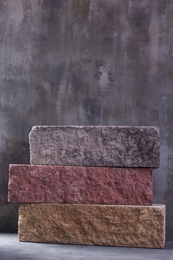 Construction Brick on Abstract Cement Background Texture. Construction ...