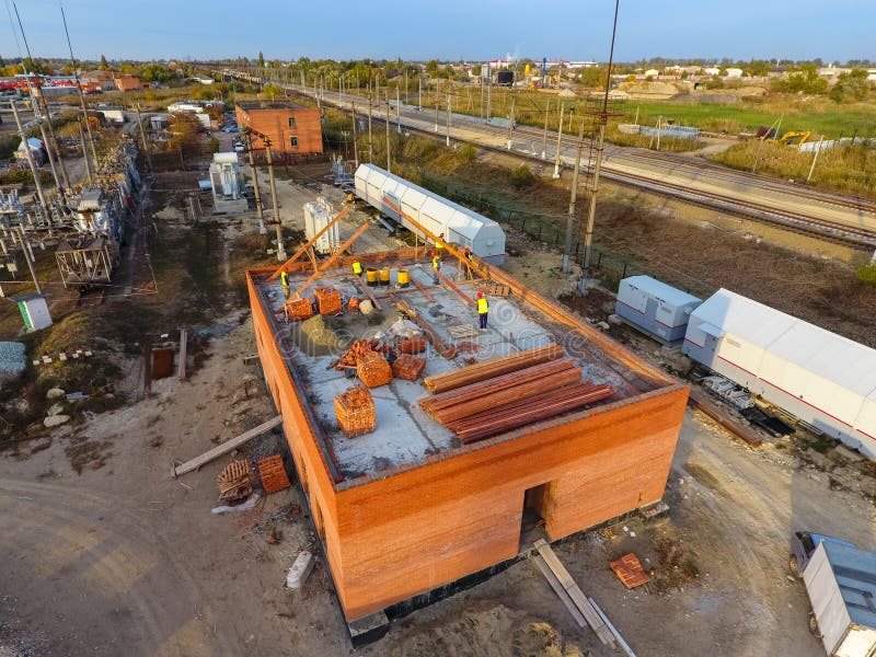 Construction of a Brick Building. Installation of the Roof ...