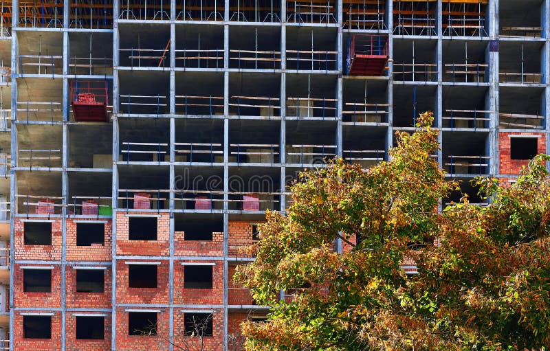 Construction of a Brick Multi Storey Building. Packing Bricks on Floors ...