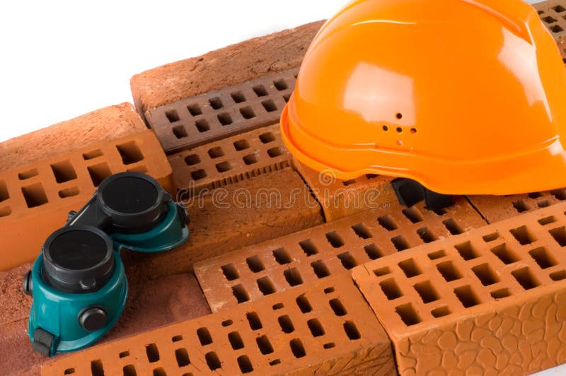 Construction Bricks and Helmet Stock Photo - Image of masonry, lining ...