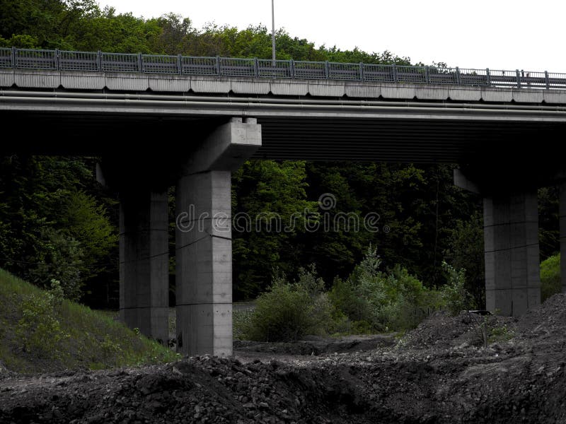 Construction of the Bridge, and Green Trees and Grass in the Background ...