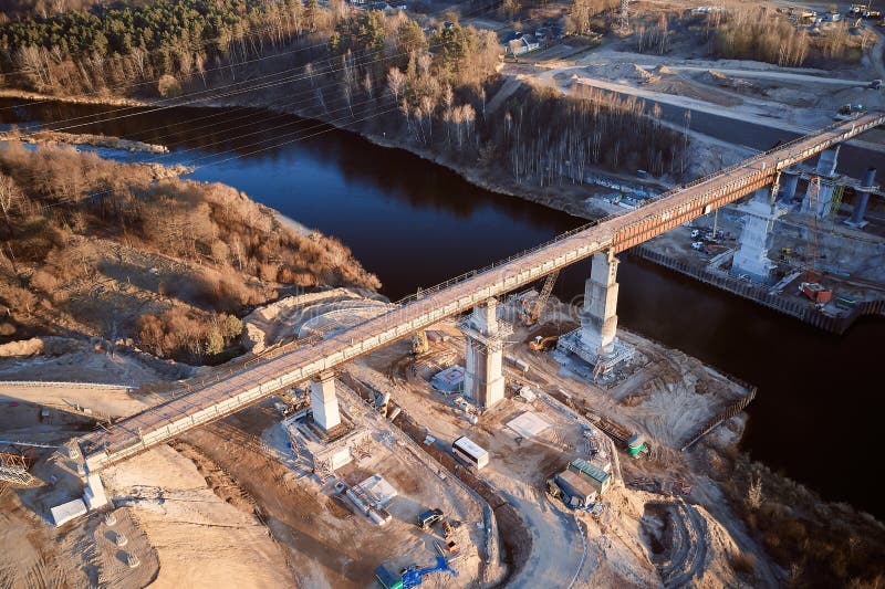 Construction of a Bridge Over the River Stock Photo - Image of metal ...