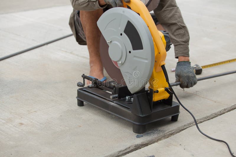 Construction Builder Worker with Grinder Machine Cutting Metal R Stock ...