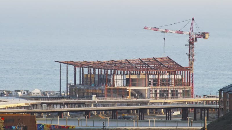 Construction of a Building on the Coast by the Sea. Monolithic ...