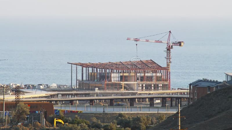 Construction of a Building on the Coast by the Sea. Monolithic ...