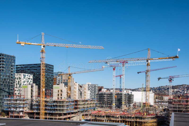 Construction Building with Cranes and Derrick Stock Photo - Image of ...