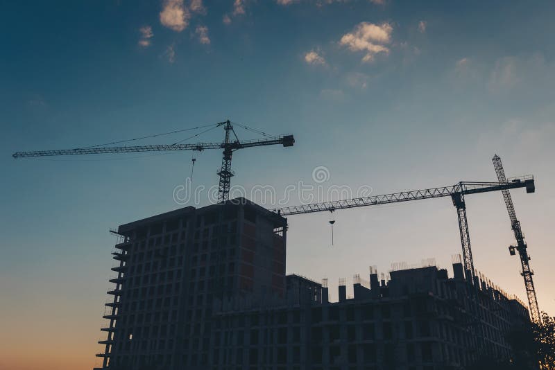 Construction of the Building Cranes in the Strongest Light, Otherwise ...