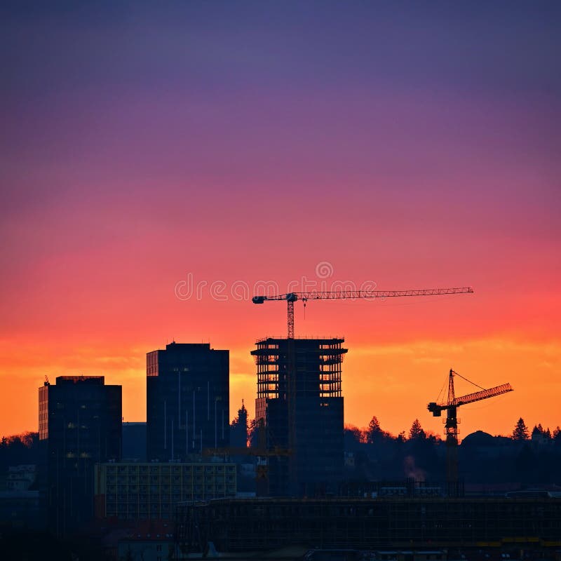 Construction of Buildings with a Crane, Workers and Construction ...