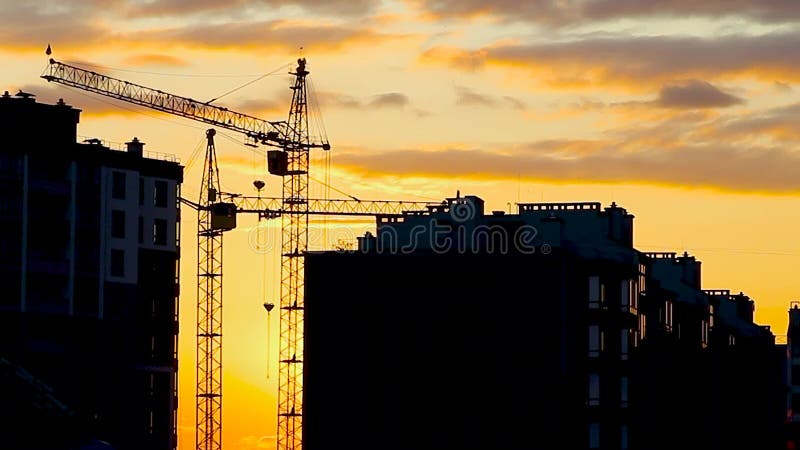 Construction Buildings and Cranes. Building Under Construction in the ...