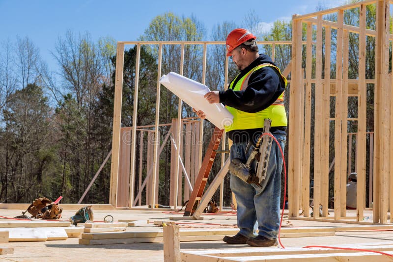Construction of a Built Home is Inspected on the Construction Site ...
