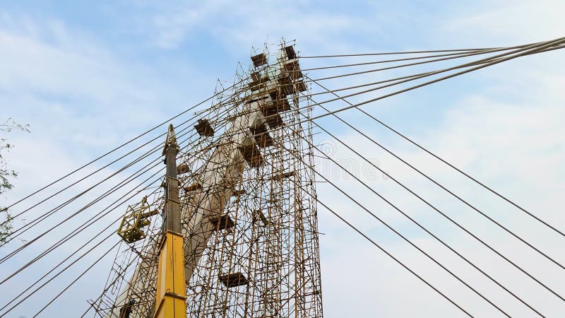 Construction of a Cable-stayed Bridge with a Crane and Scaffolding ...