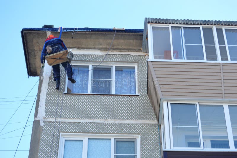 Construction climbing editorial stock image. Image of repair - 272381659