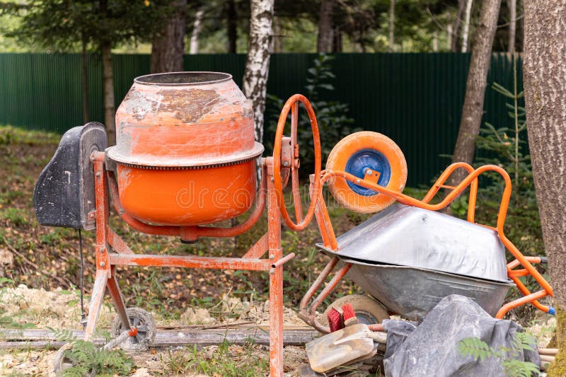 Compact Concrete Mixer and Cart Stock Photo - Image of worker, water ...