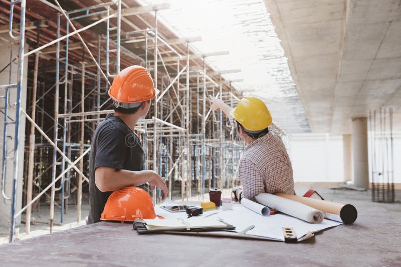 Construction Concept of Engineer and Architect Working with ...