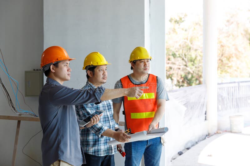 Construction Concept of Engineer and Architect Working with ...