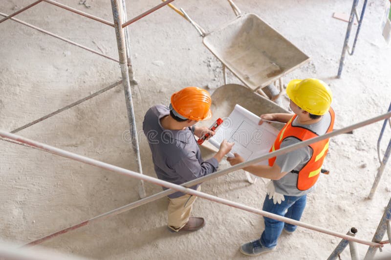 Construction Concept of Engineer and Architect Working with ...