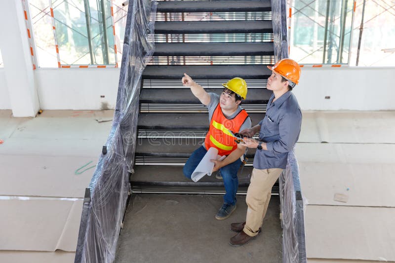 Construction Concept of Engineer and Architect Working with ...