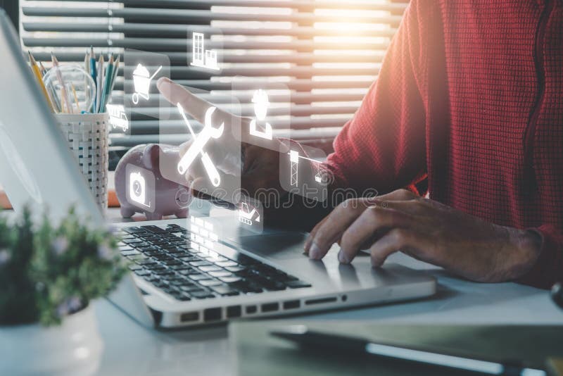 Person Working on Laptop Computer on Desk with DevOps Icon on Virtual ...