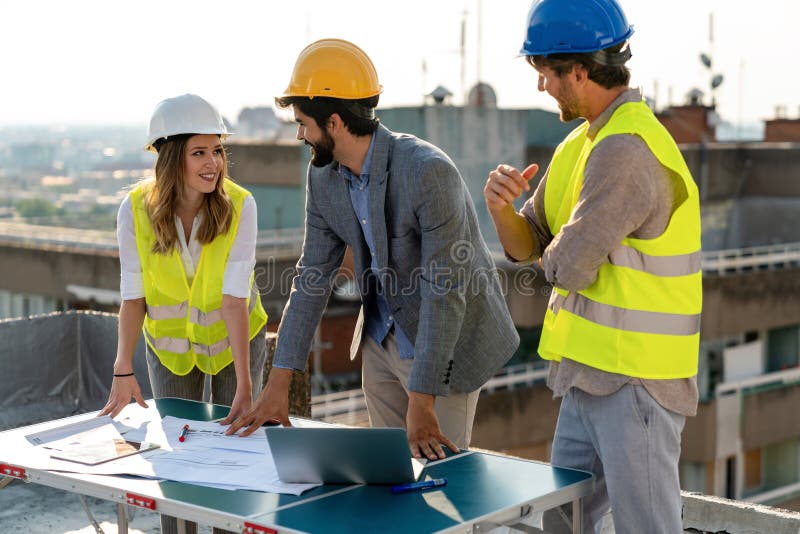 Construction Concept. Engineers and Architects Working at Construction ...