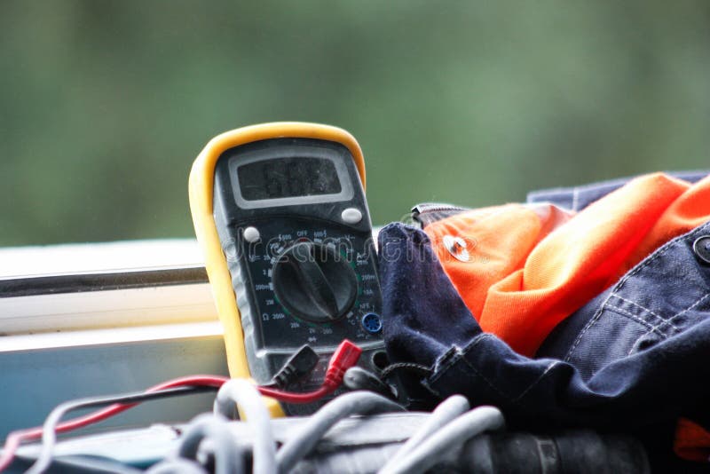 Construction Concept. Multimeter and Work Suit Stock Image - Image of ...