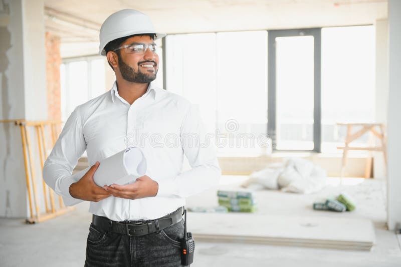Construction Concept. Portrait of a Young Architect at a Construction ...