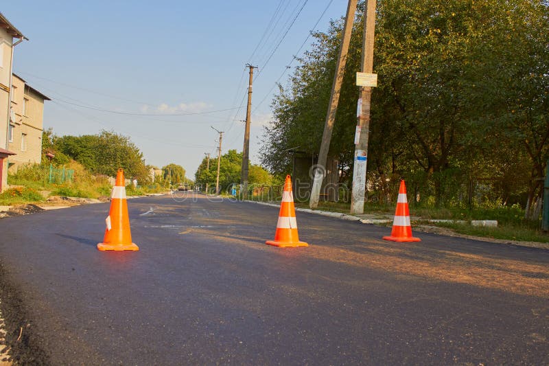 Construction Cones on a New Asphalt Road,construction of Asphalt on the ...