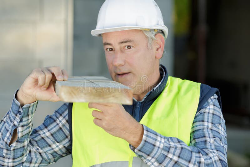 Construction Contractor Carrying Beam Stock Photo - Image of camera ...