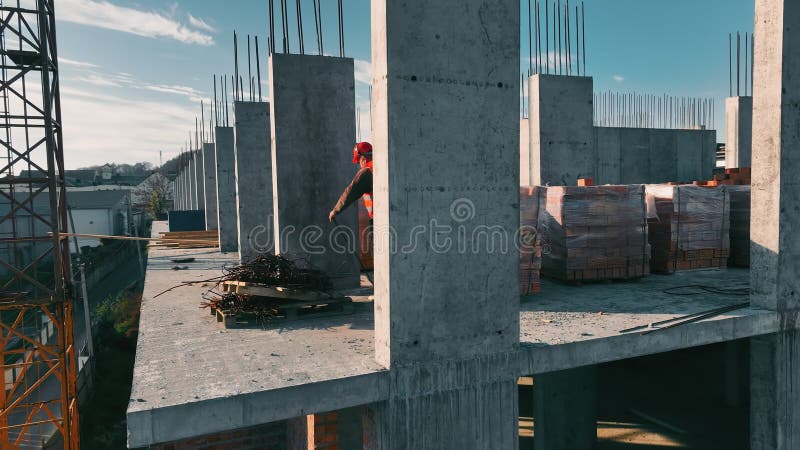 Aerial Top View Construction of a Cottage House. Builders Build a House ...
