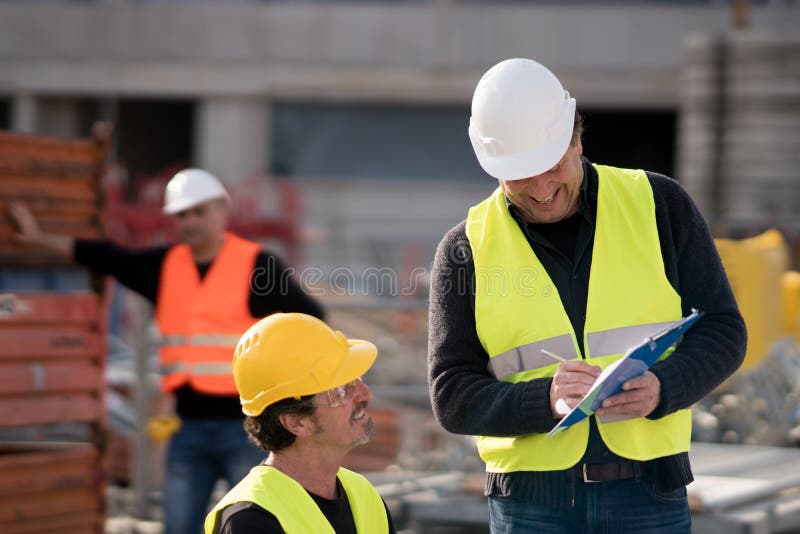 Construction Coworkers at Work Stock Photo - Image of contractor ...