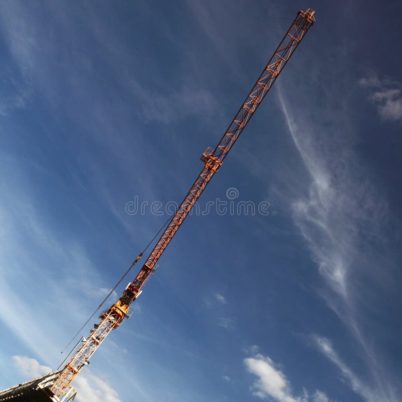 Crane lifting heavy object stock photo. Image of mechanized - 16007210