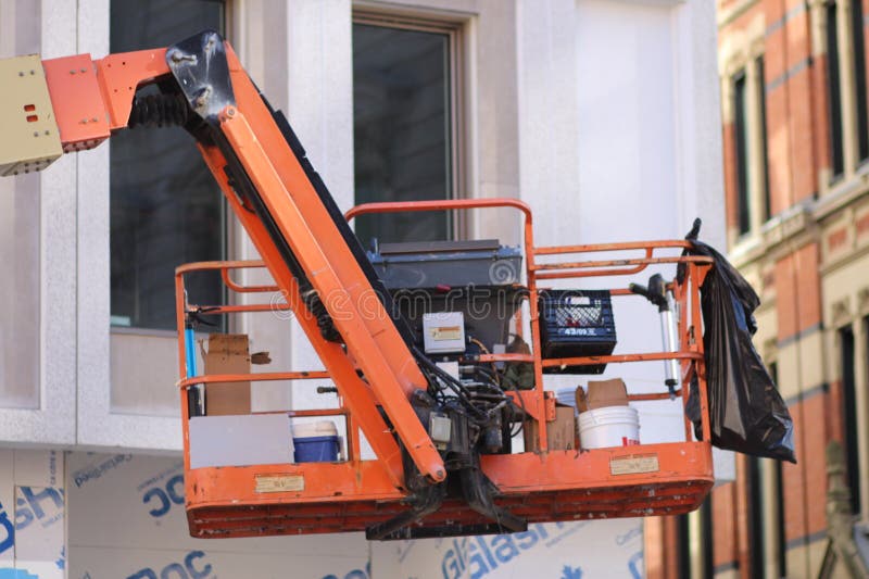 Construction Crane in Action at a Building Site Stock Image - Image of ...