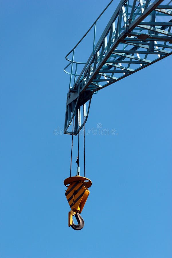 Construction Crane Arm with Hook Against Blue Sky Background Stock ...