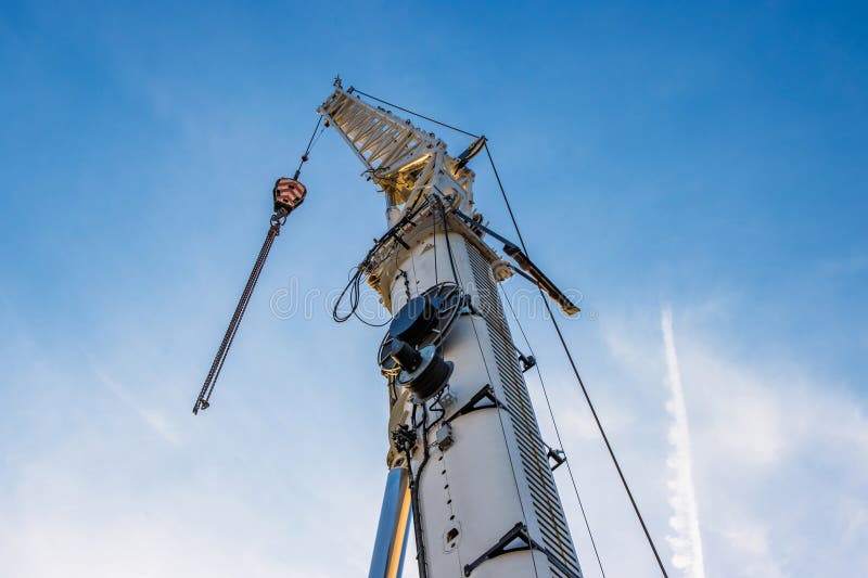 Construction Crane Arm with Hook with Cable Against Clear Blue Sky ...