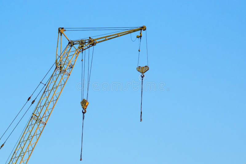 Construction Crane on Blue Background Stock Photo - Image of ...