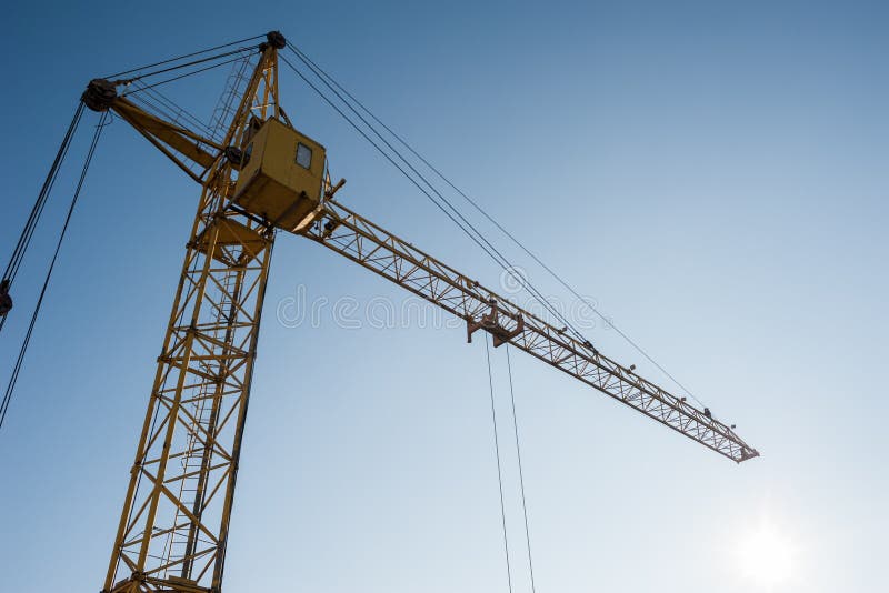 Construction crane stock image. Image of sunny, construction - 70558661