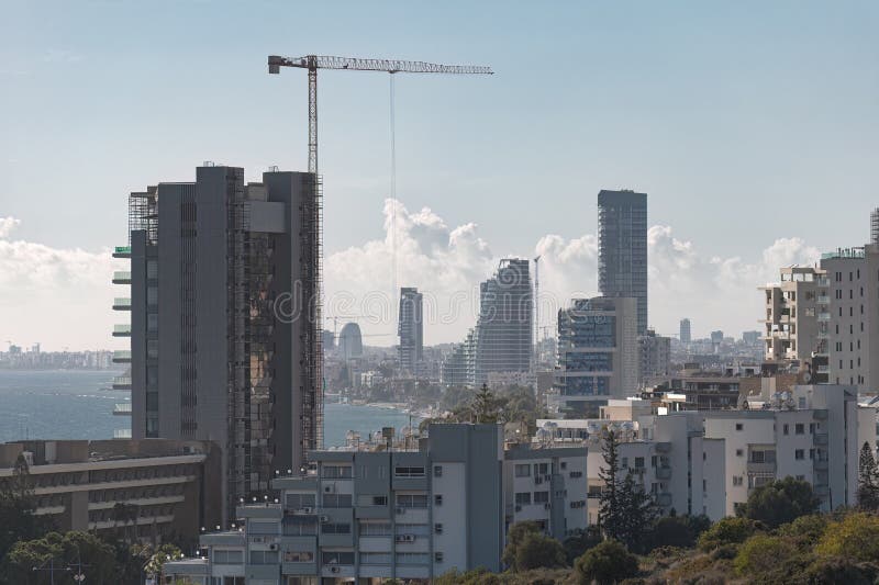Construction Crane Building Modern Skyscraper in Limassol City. Cyprus ...