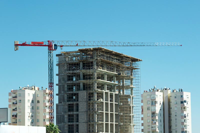 Construction Crane and Building Under Construction among Other ...