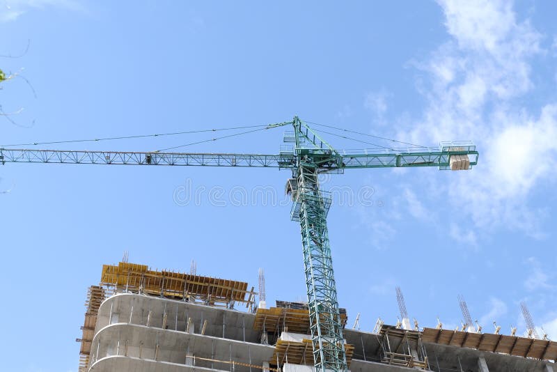 Construction Crane during the Construction of a High-rise Building ...