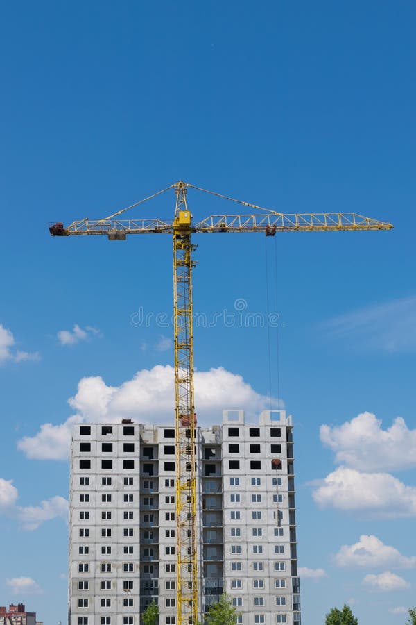 Construction crane at work stock photo. Image of architecture - 107518638