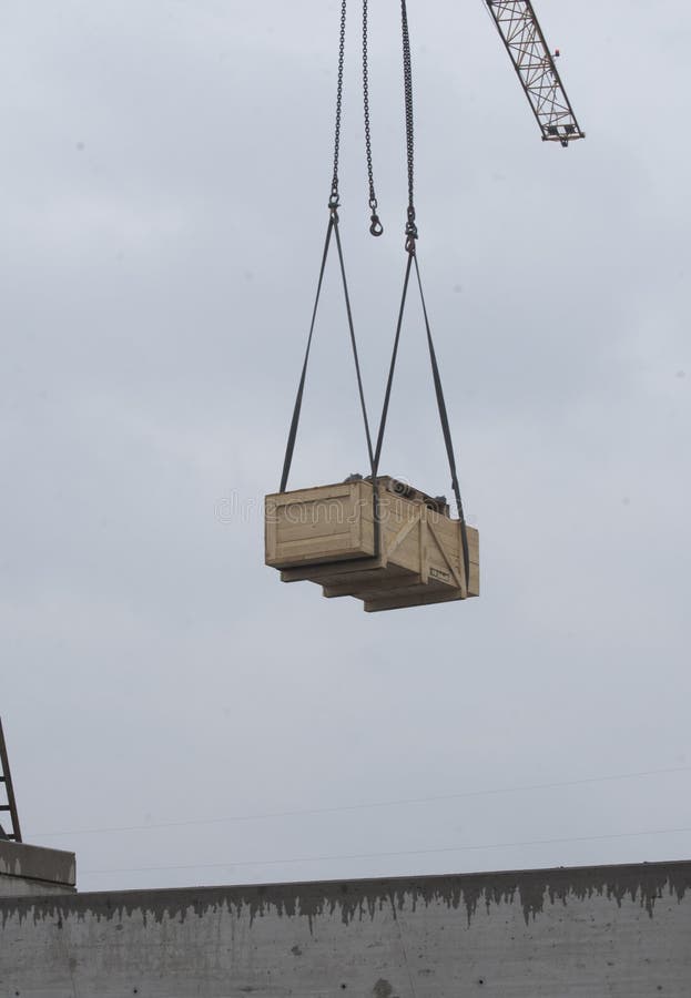 Construction Crane with Heavy Load Stock Image - Image of site, work ...