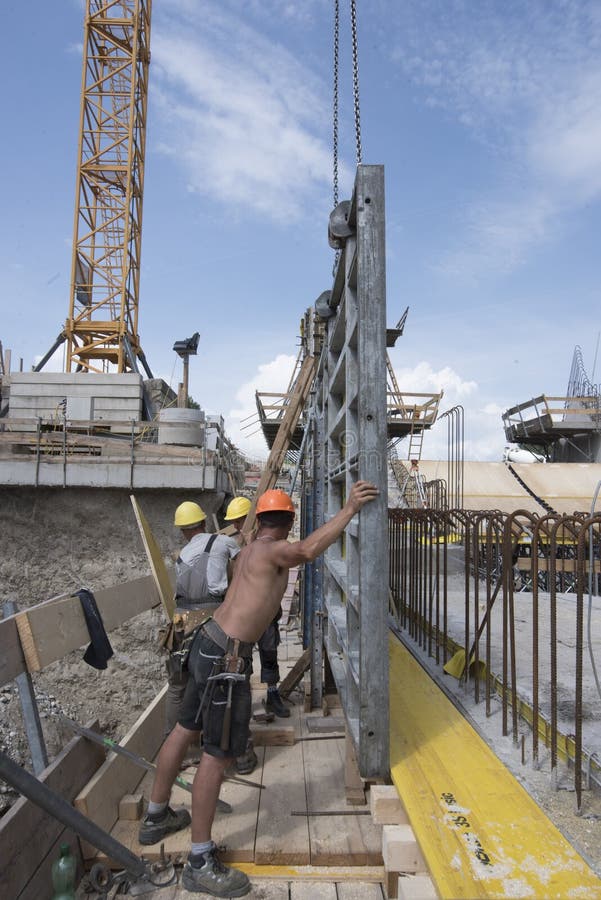 Construction Crane with Heavy Load Editorial Image - Image of workers ...