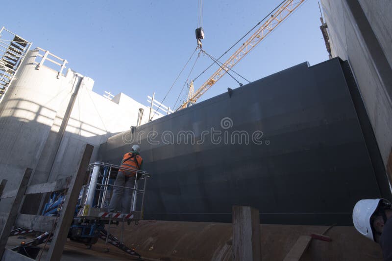 Construction Crane with Heavy Load Stock Photo - Image of market ...