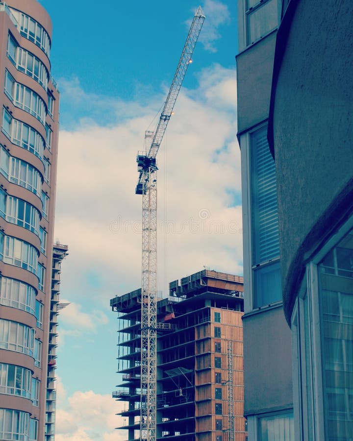 Construction Crane and High Rise Buildings Stock Photo - Image of ...